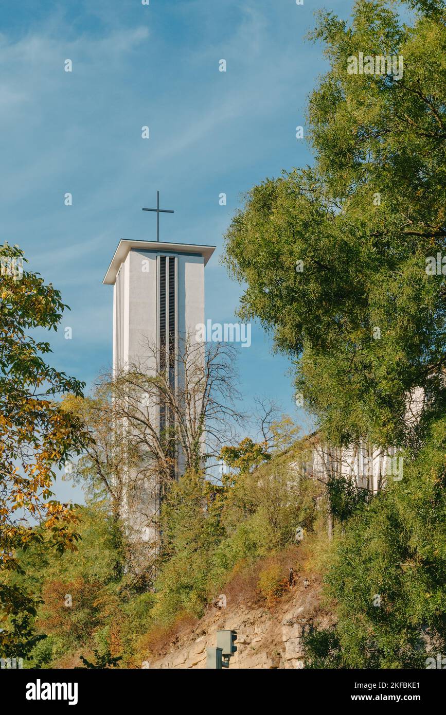 Modern Church Tower with Big Metal Cross. Shot of a modern bell of a ...