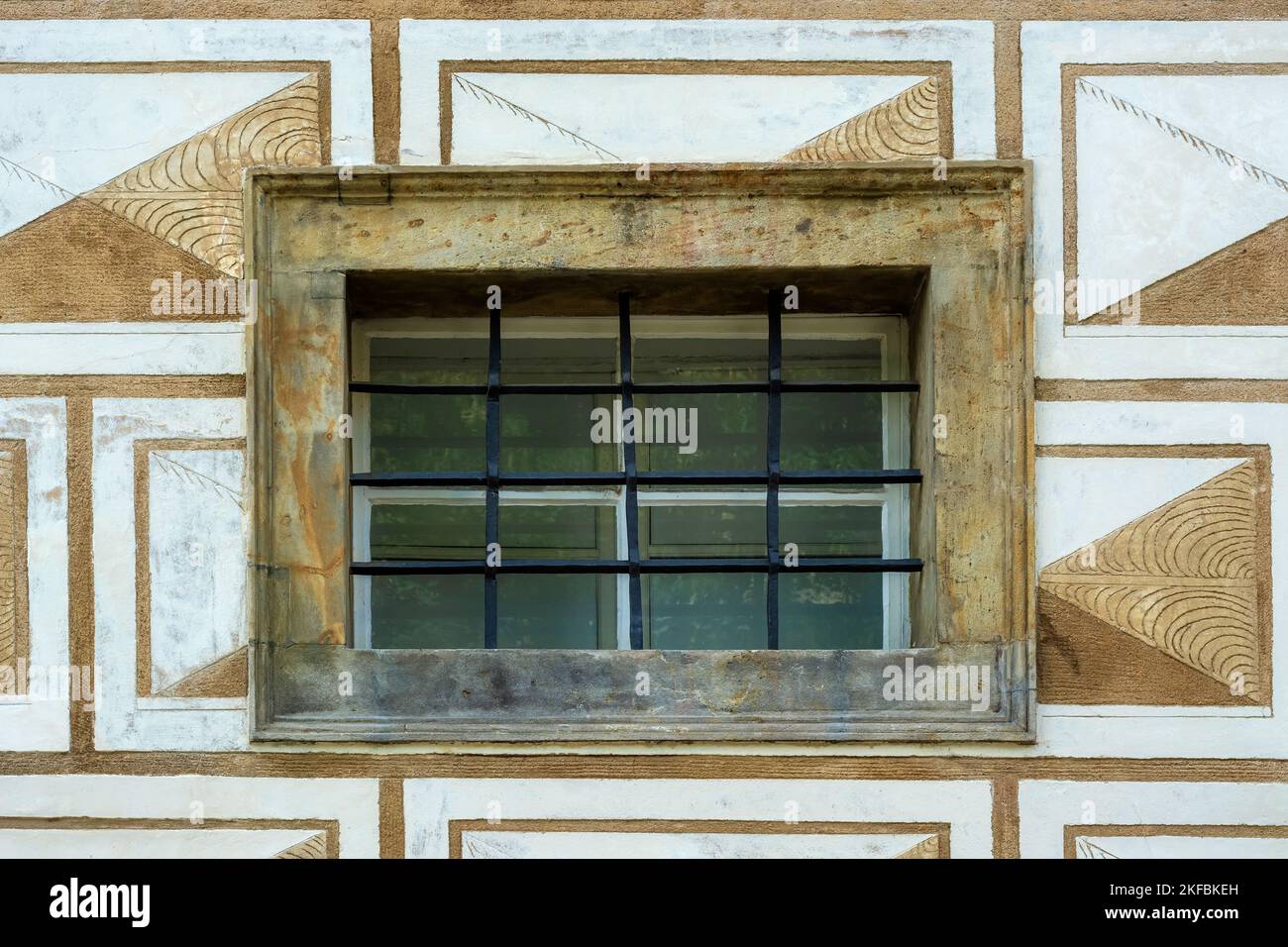 Small rectangular window with metal bars. From the Window of the World ...