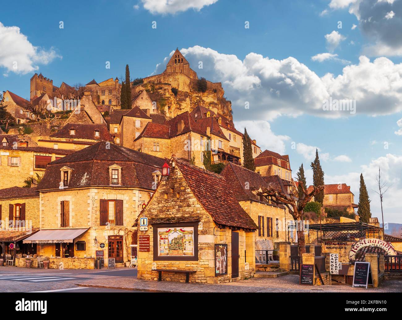 A salamander on a wall, the emblem of the town of Sarlat, in Dordogne ...