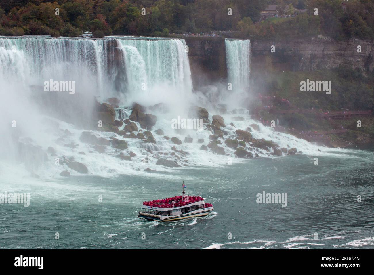 An aerial view of beautiful cruise ships with mesmerizing Niagara Falls ...