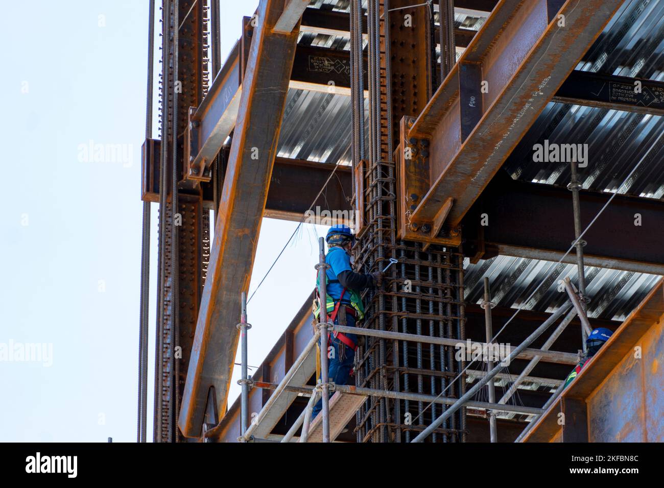 man welding steel on a girder at heights, building structure, mexico ...