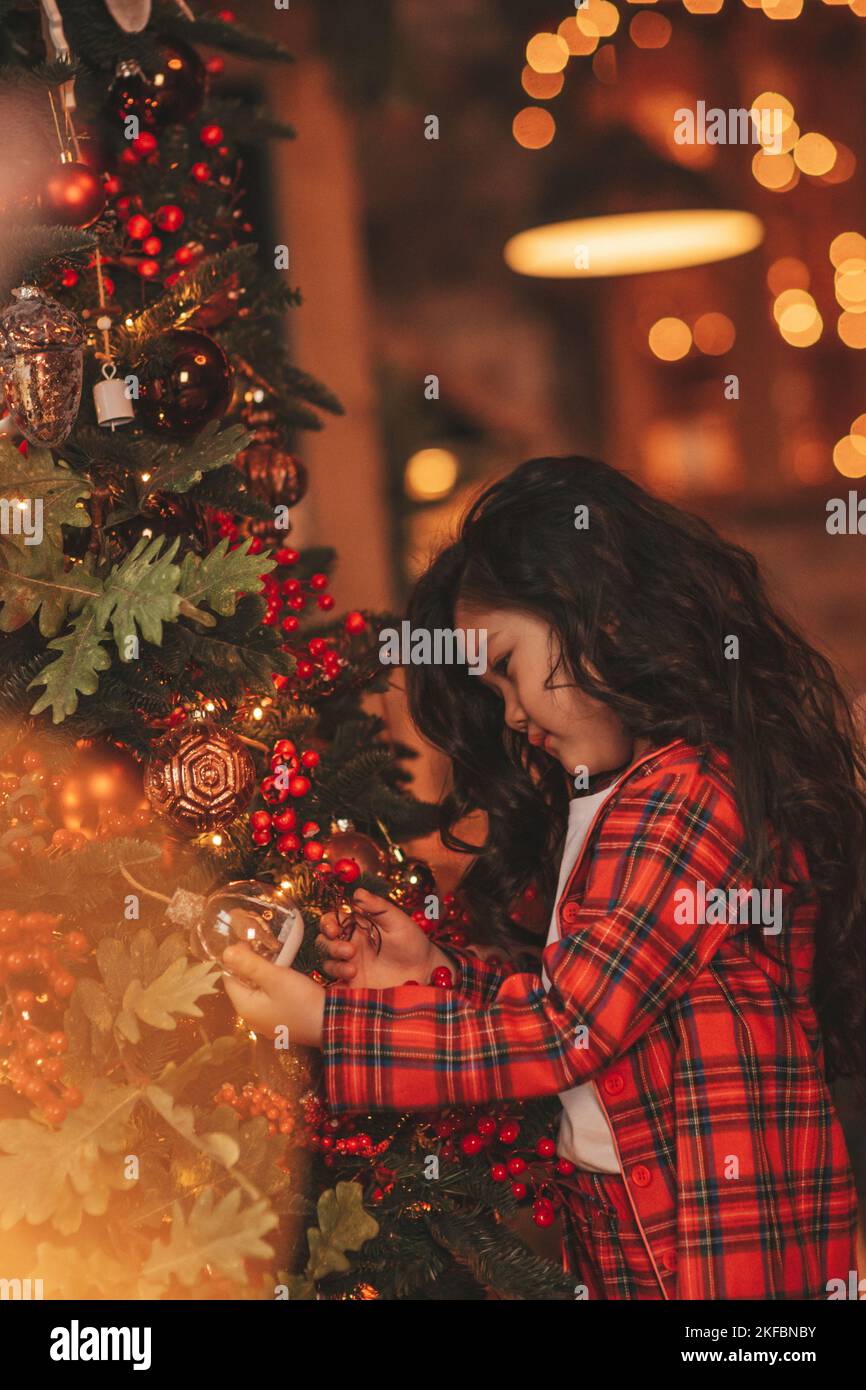 Happy cute japan little girl dreamer waiting miracle from Santa posing ...