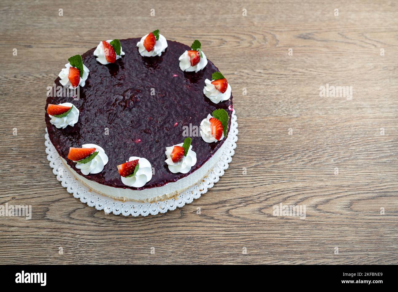 fruit cake with marmalade and whipped cream Stock Photo - Alamy