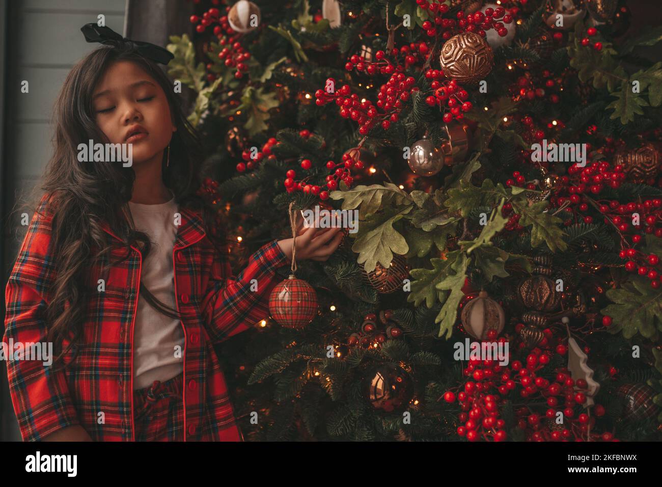 Happy cute japan little girl dreamer waiting miracle from Santa posing ...