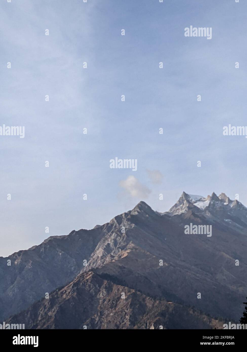 A vertical shot of beautiful mountains in India Stock Photo - Alamy