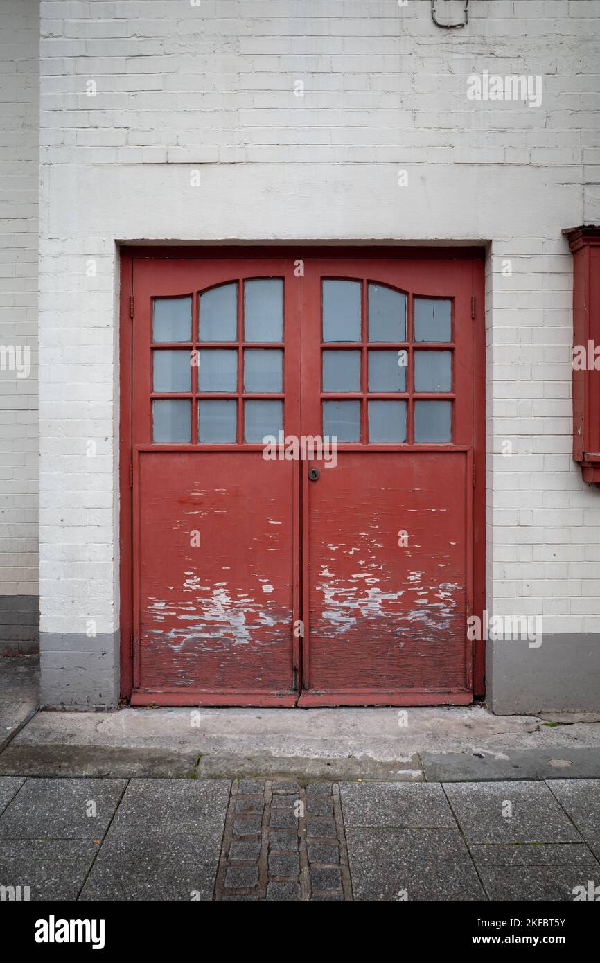 Red double door Stock Photo - Alamy