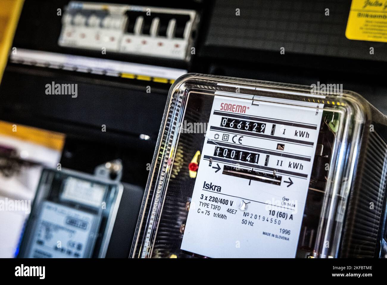 ILLUSTRATIVE - An old-fashioned electricity meter in a meter box. Many ...