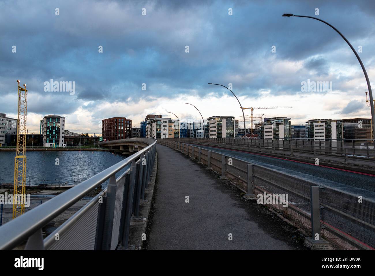 Sir Steve Redgrave Bridge on a stormy evening, Newham, London Stock ...
