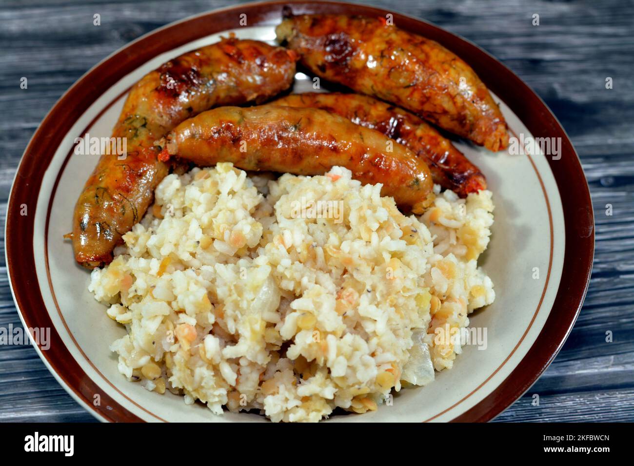 Egyptian hot steamed white rice with yellow lentils Koshary and deep ...