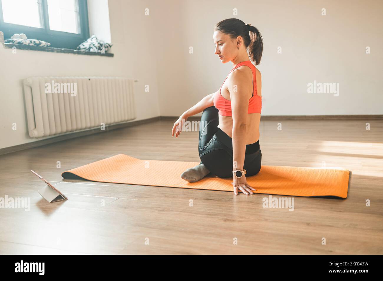 Two beautiful woman talking and laugh in the bedroom after practice ...