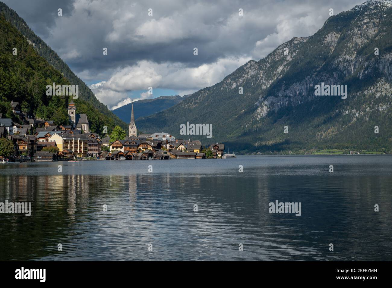 A beautiful landscape view of Hallstatt city surrounded by breathtaking ...