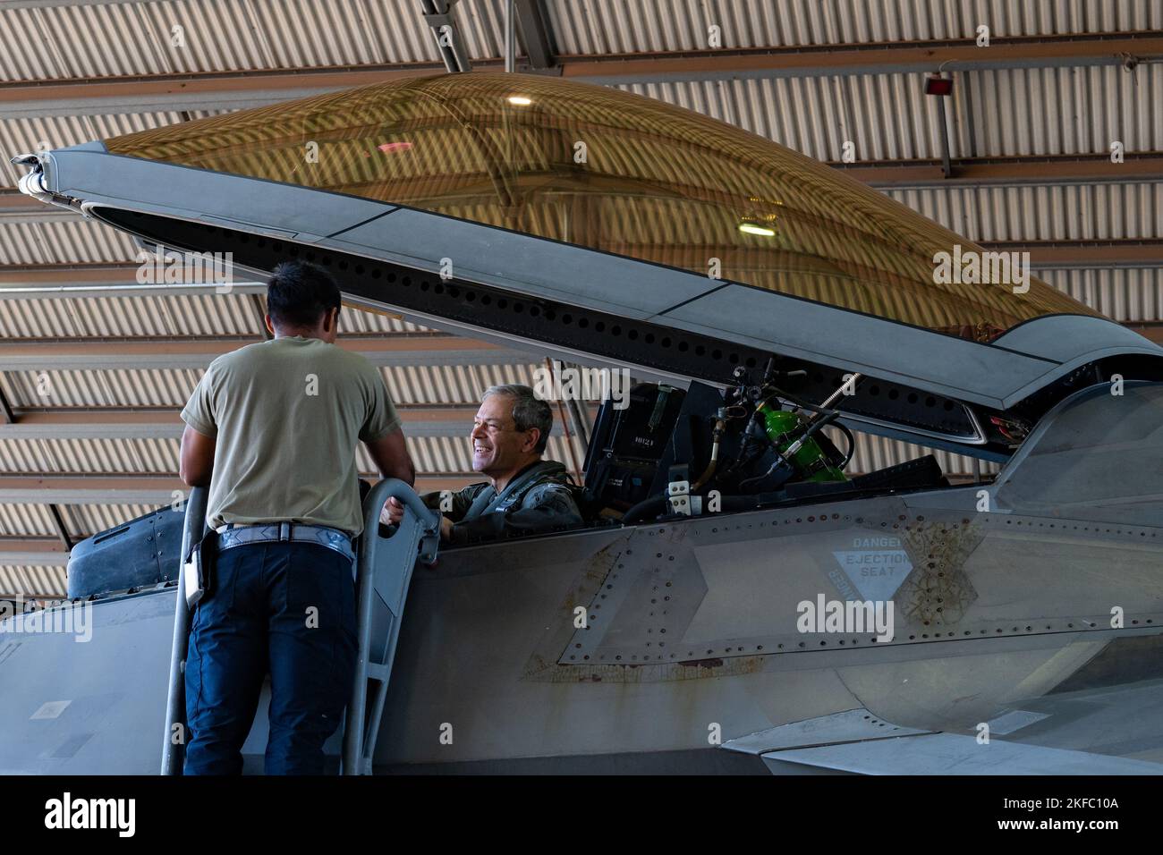 U.S. Air Force Gen. Ken Wilsbach, Pacific Air Forces commander, shakes ...
