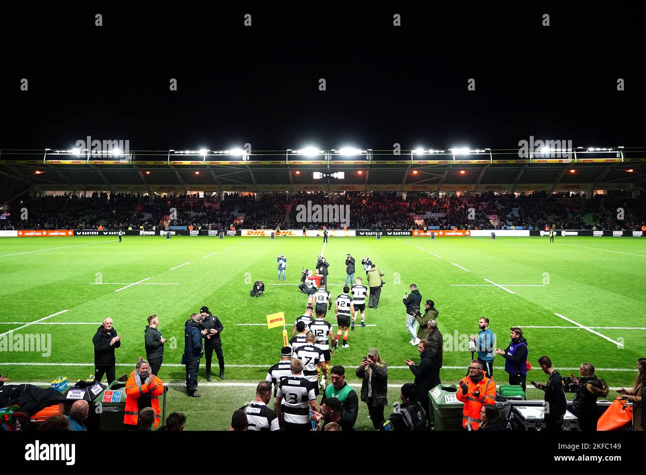 Barbarians players make their way onto the field before the ...