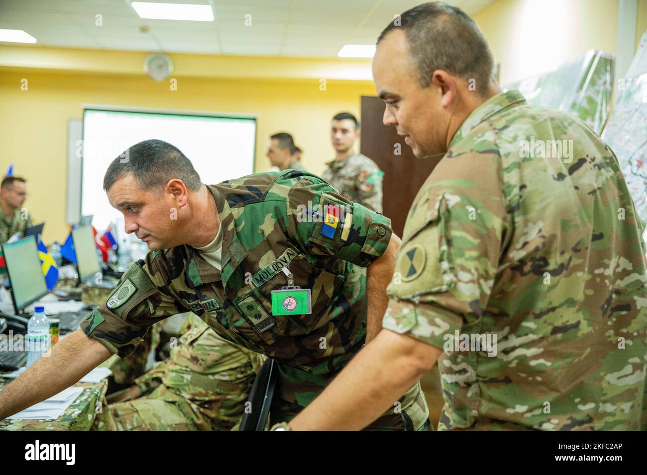 U.S. Army Master Sgt. Tyler Lawver (right), acting Multinational ...