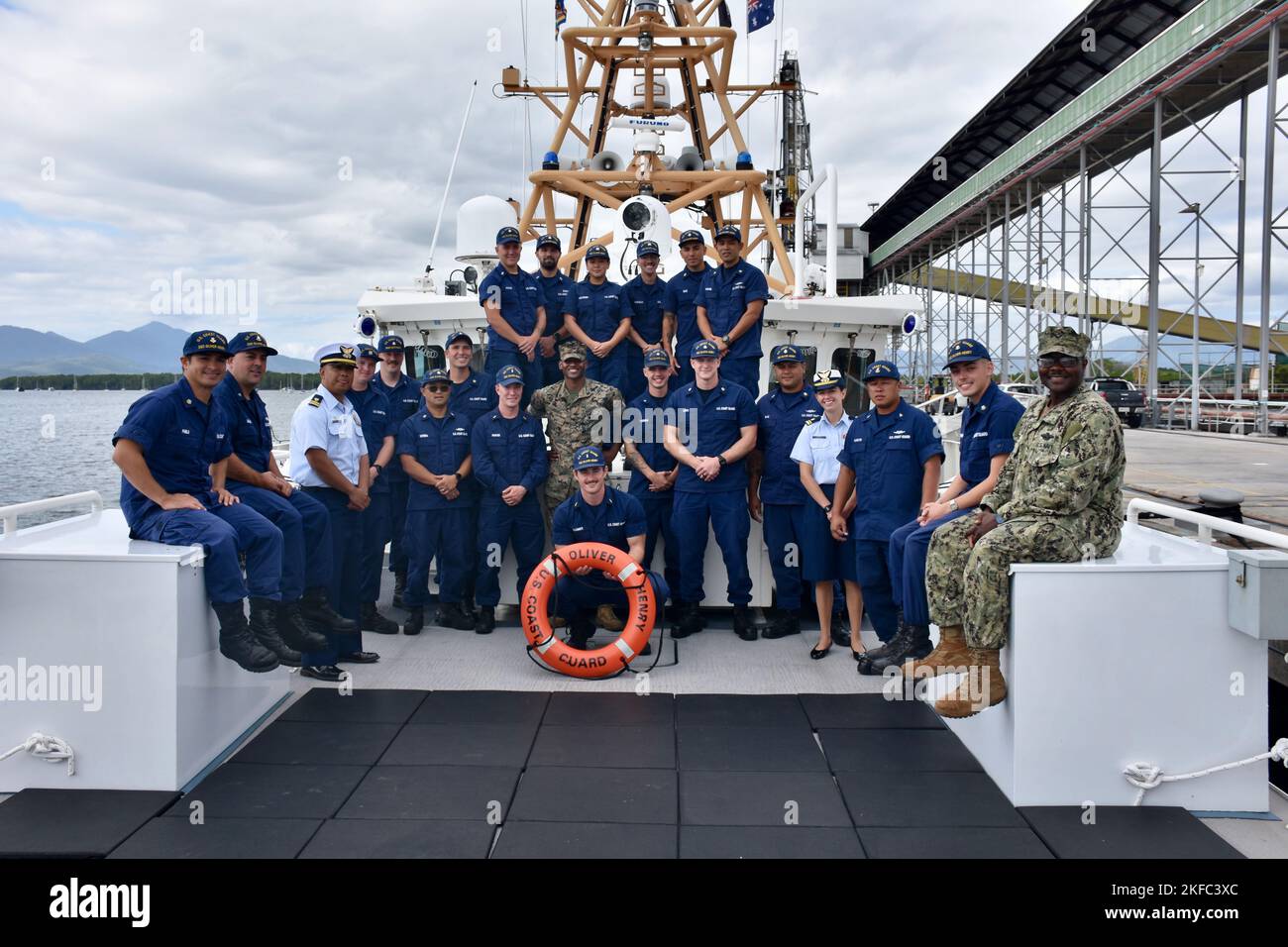 The crew of the Sentinel-class fast response cutter USCGC Oliver Henry ...