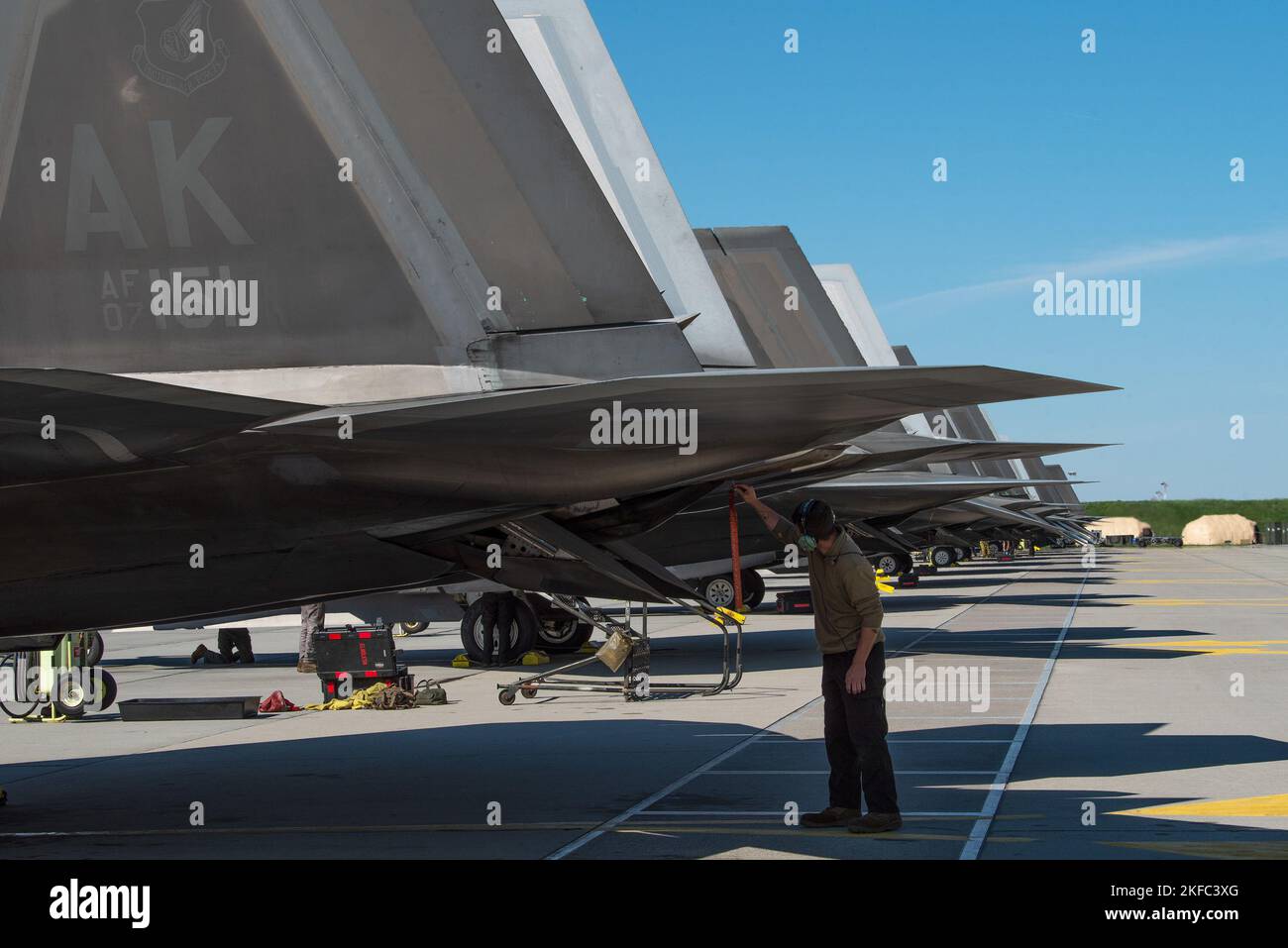 U.S. Air Force maintainers from the 90th Expeditionary Fighter Squadron ...