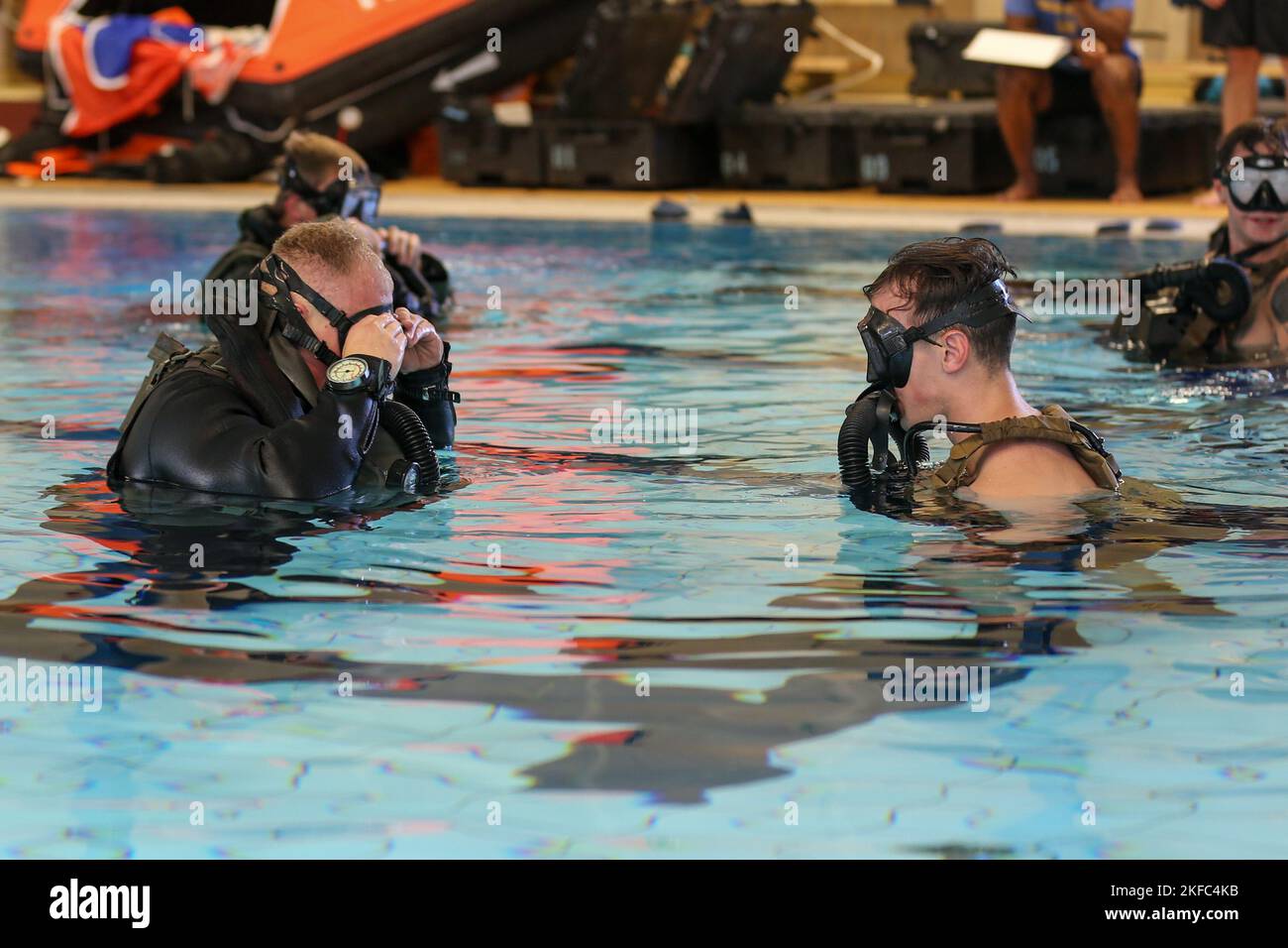 A Swedish Marine (left) with 2d Swedish Marine Battalion and a U.S ...