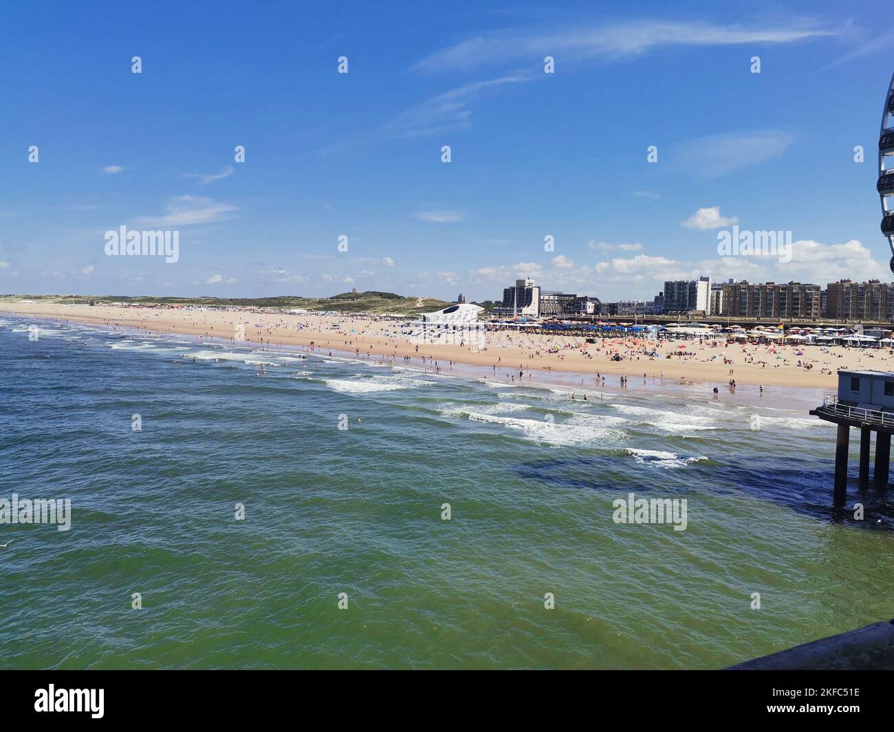 The Rotterdam beach, Netherlands, with a lot of people swimming and ...