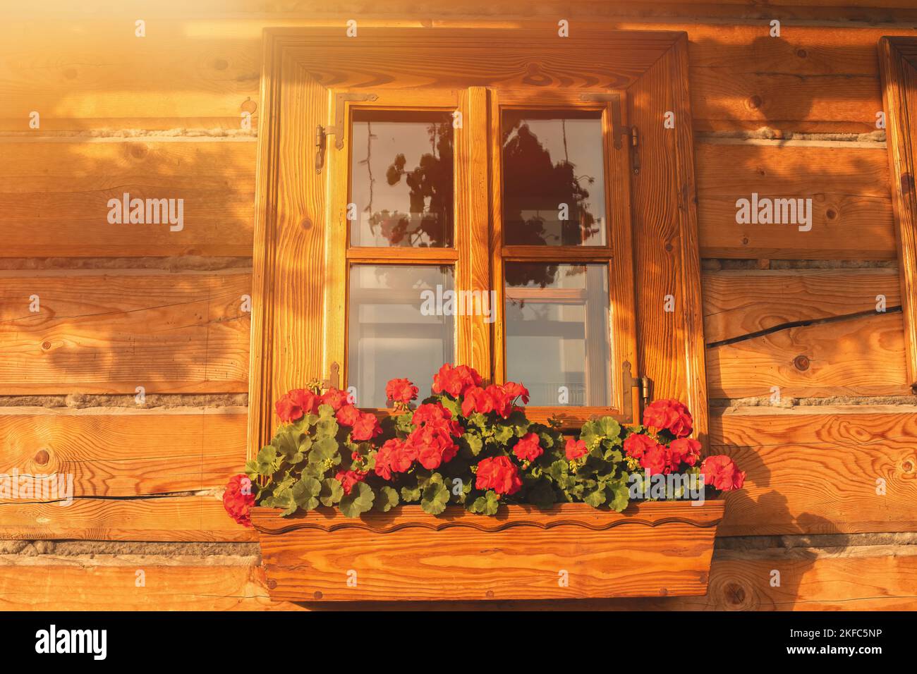 Nicely decorated window of a log cabin house Stock Photo - Alamy