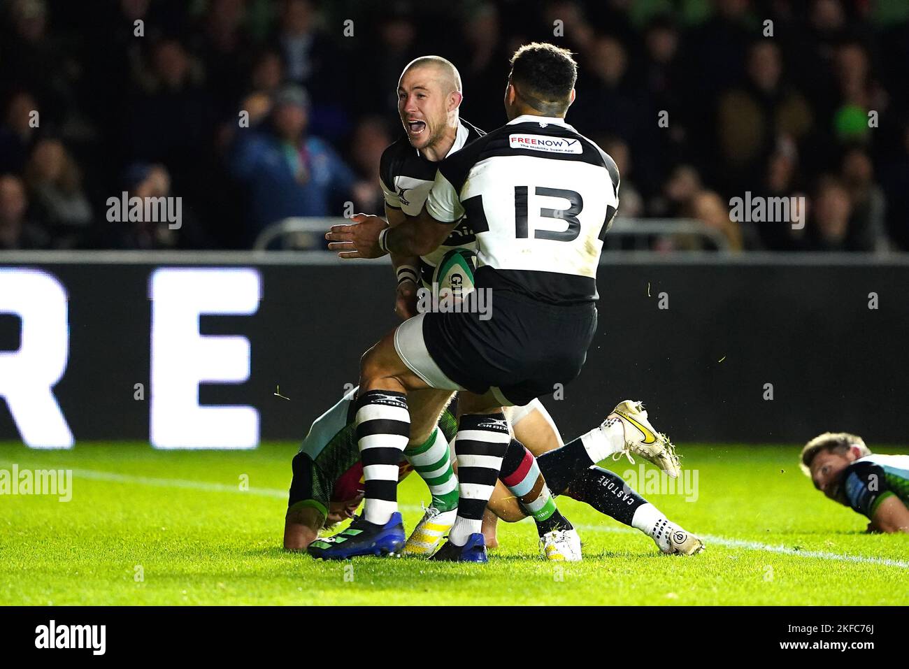 Barbarians' Mike Brown (left) celebrates scoring their side's third try ...