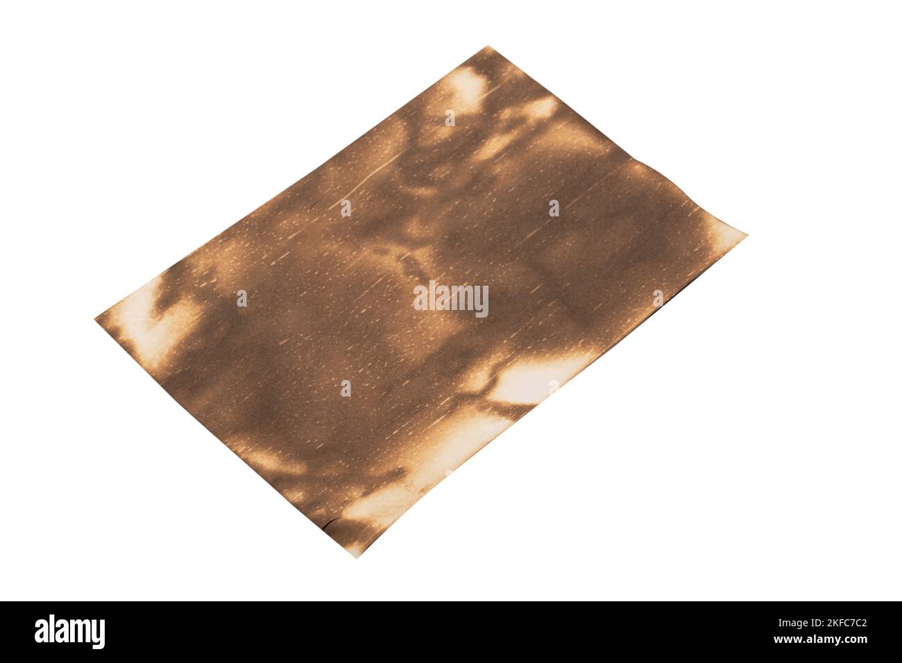 Burnt paper isolated on a white background. Copy space Stock Photo - Alamy