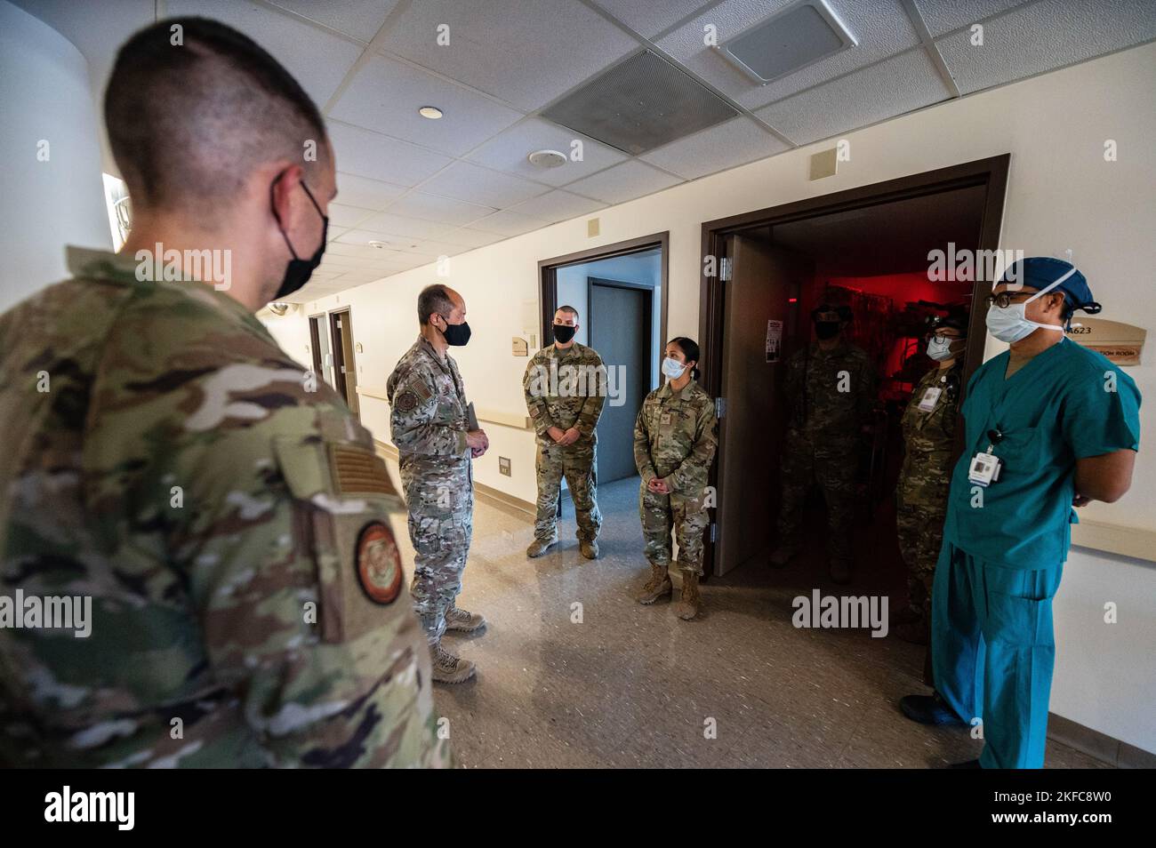 U.S. Air Force Col. Rudolph Cachuela, center left, Air Mobility Command ...