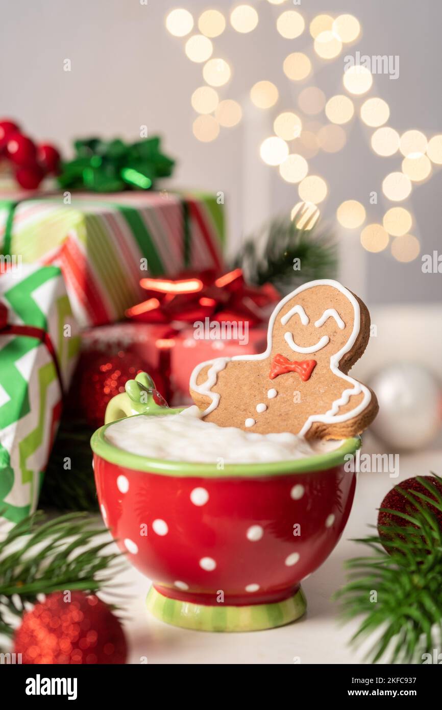 Gingerbread cookie man in a hot cup of cappuccino Stock Photo - Alamy