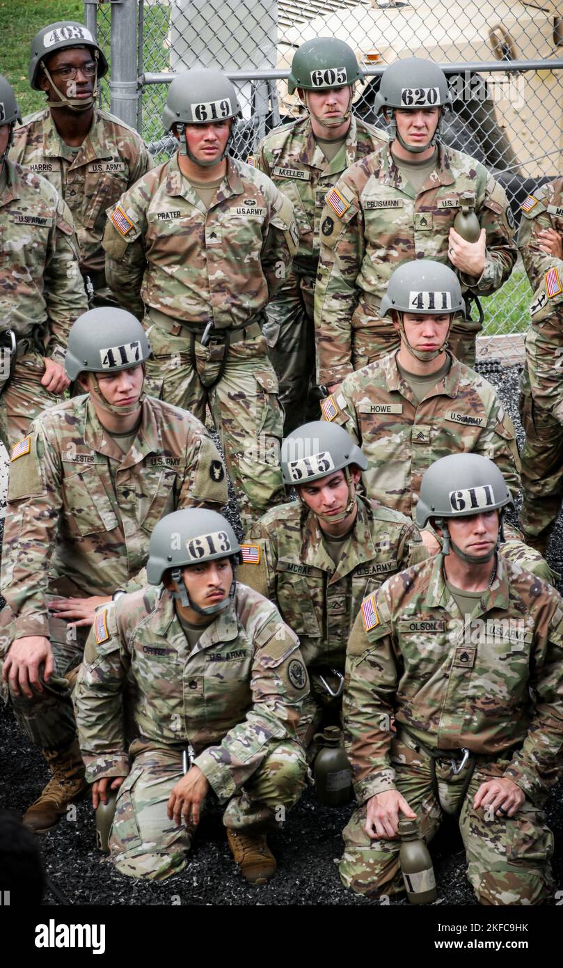 U.S. Soldiers and Airmen observe a demonstration of basic belaying operations during an Air ...