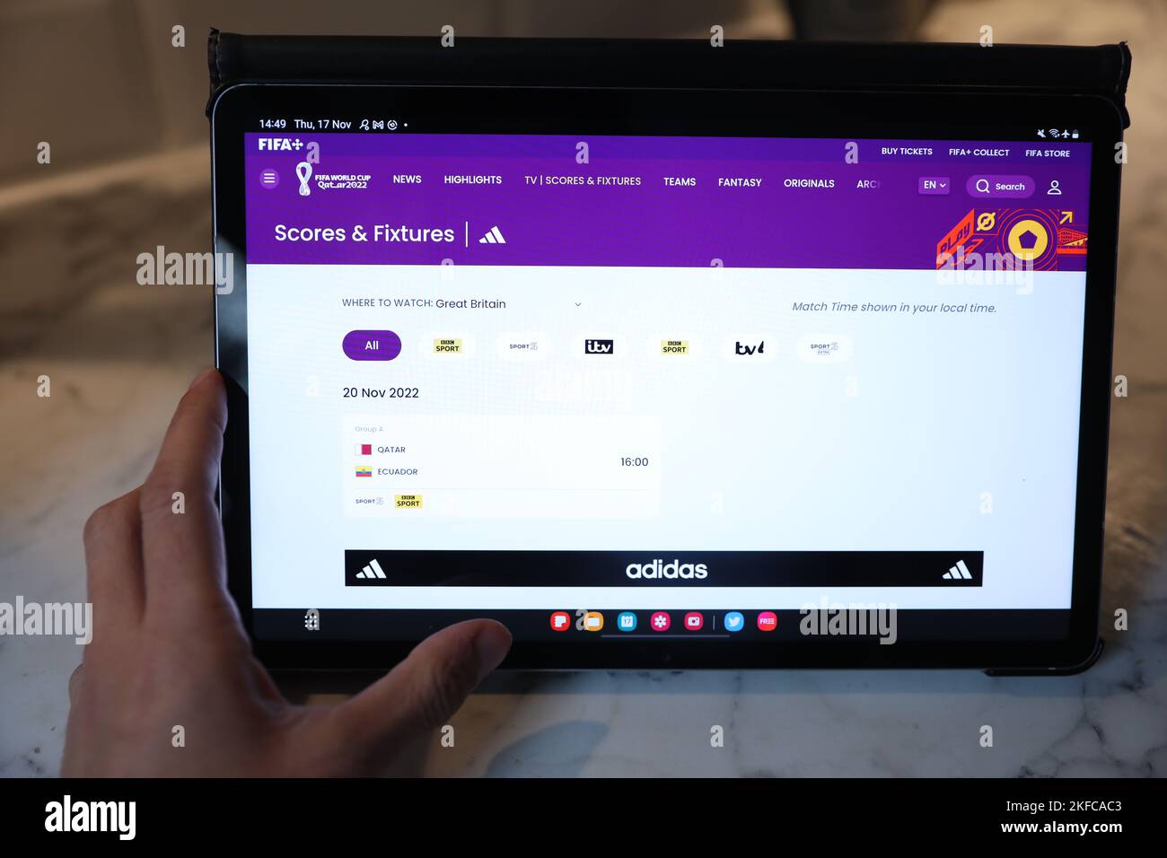 London, UK. 17 November, 2022. A tablet screening the first match of ...