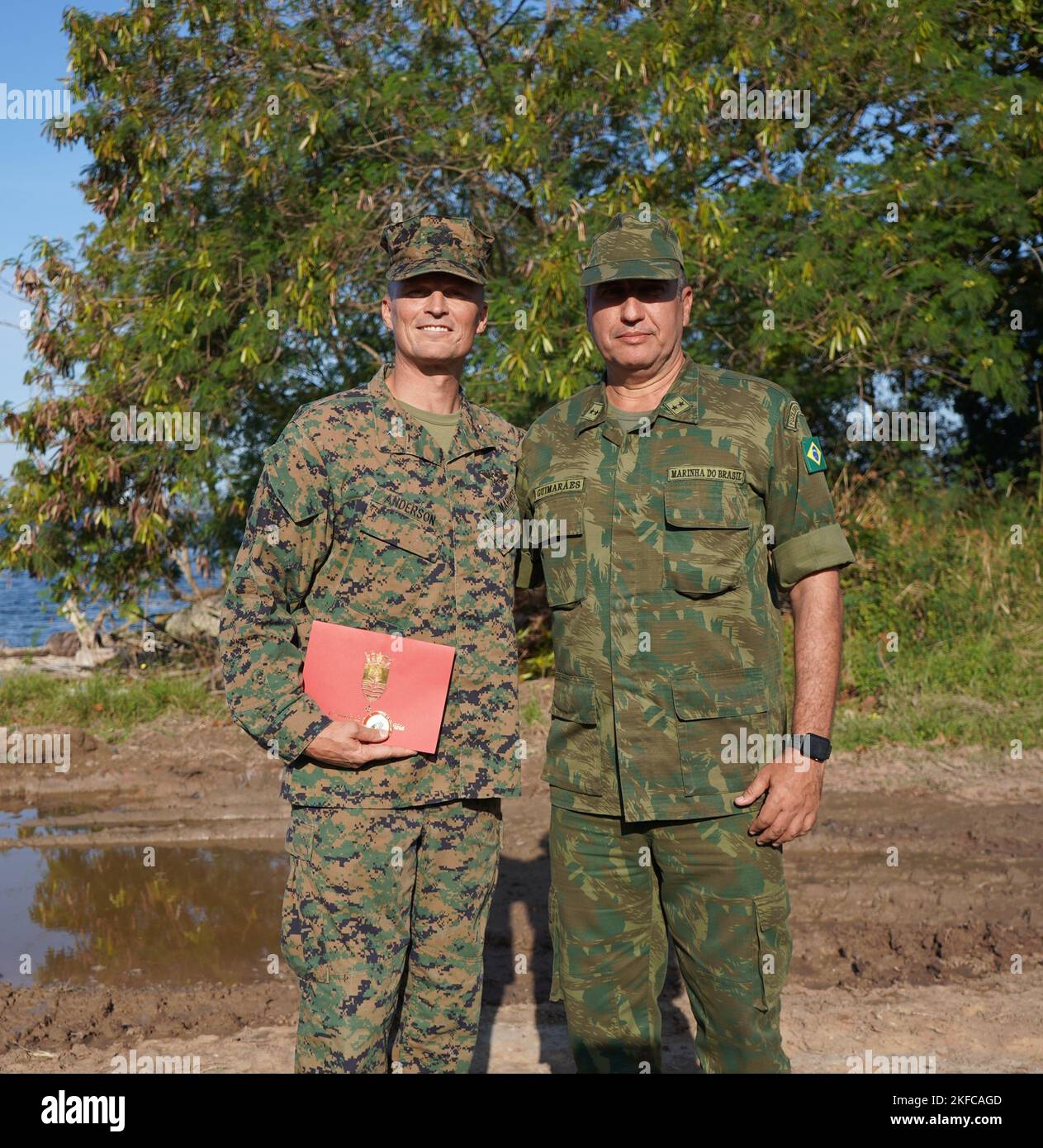 Brig. Gen. Len "Loni" Anderson, left, commanding general of 4th Marine Aircraft Wing, Marine ...