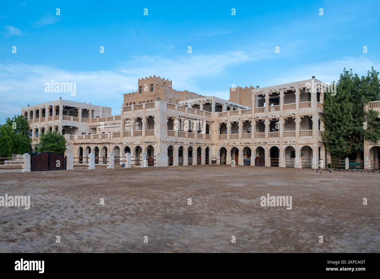 Historic building housing stables with Arabian horses near Falcon Souq ...