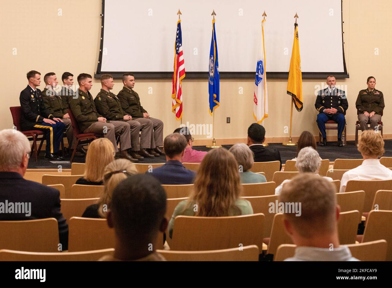 Members of the Nathan Hale Battalion Class of 2022 listen to a speaker ...