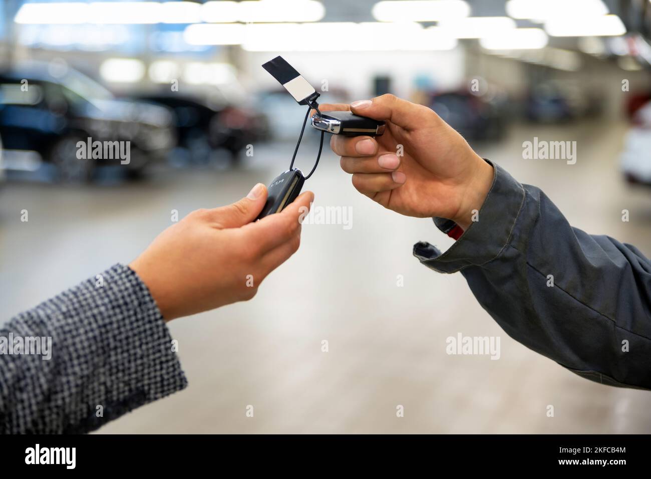 Mechanic giving contract document customer hi-res stock photography and ...