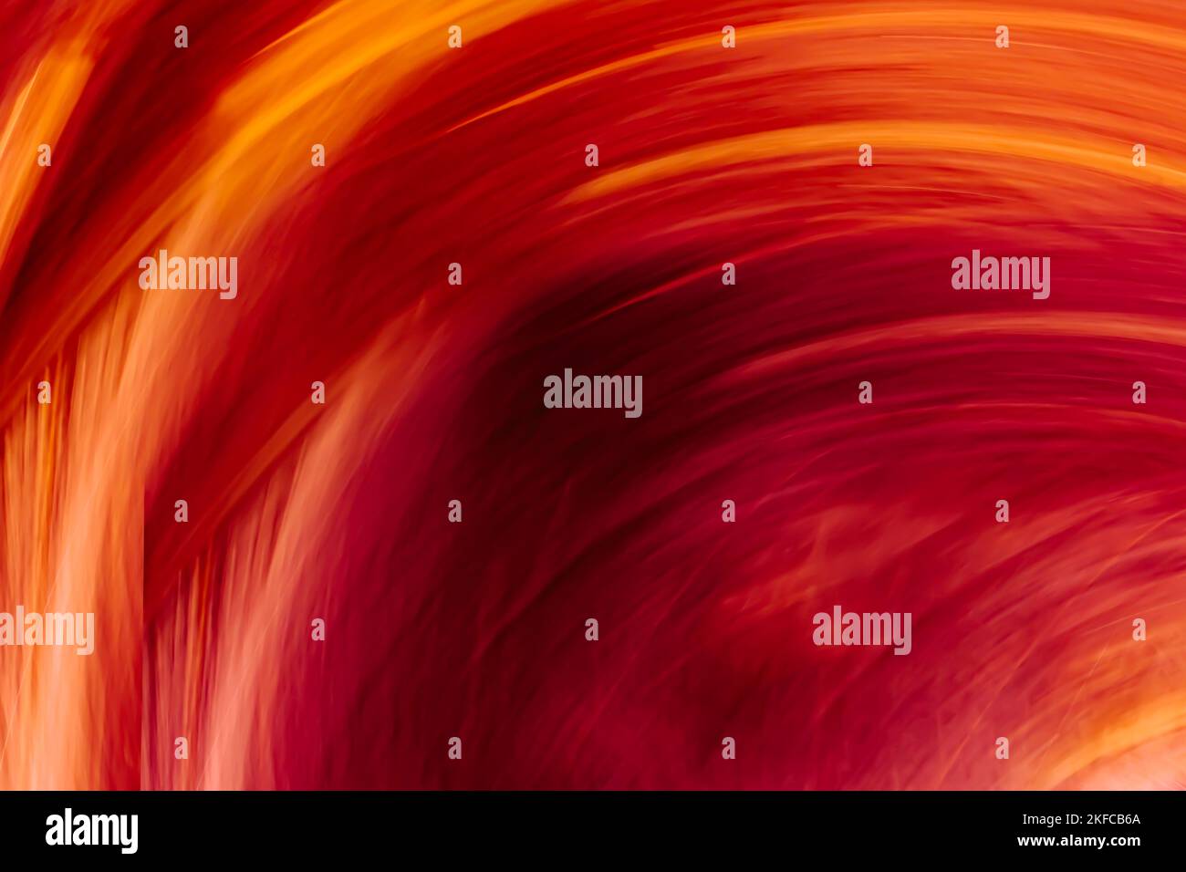 Abstract interweaving of small waves in red tones and with a gradient ...