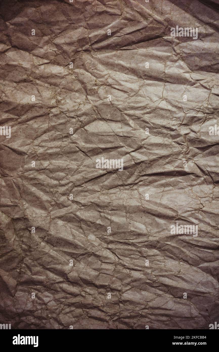 Crumpled cardboard from recycled paper with vignetting. Vertical ...