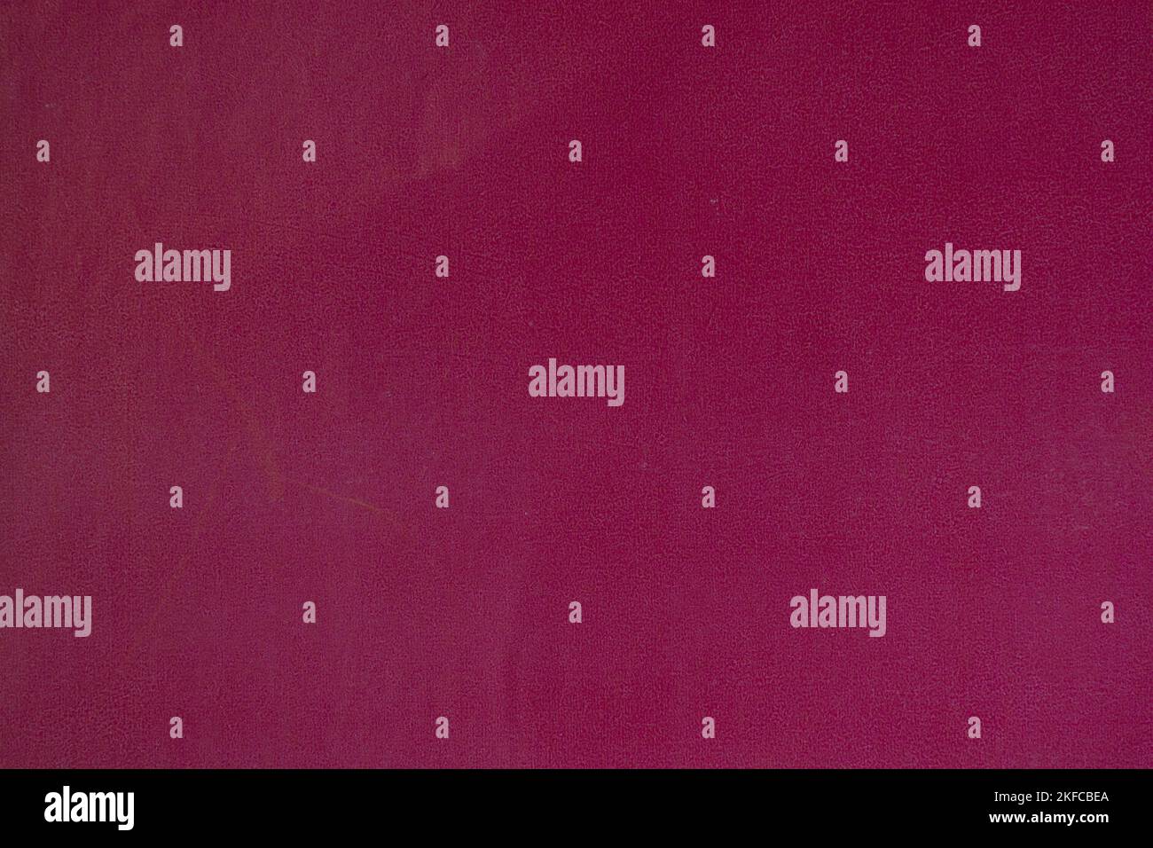 Old colored retro worn paper painted in burgundy color. Background ...