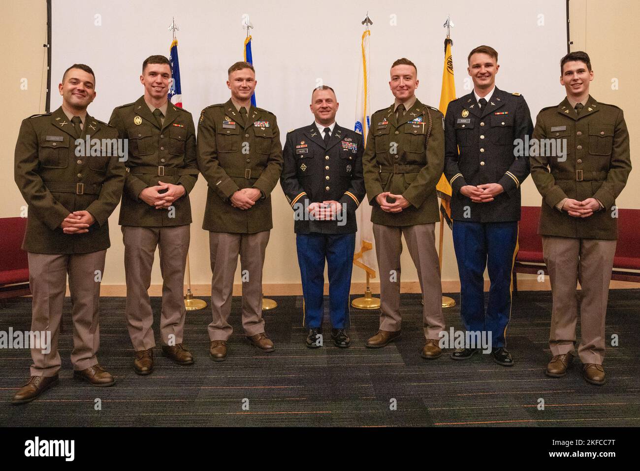 Newly commissioned officers from the Nathan Hale Battalion pose with U ...