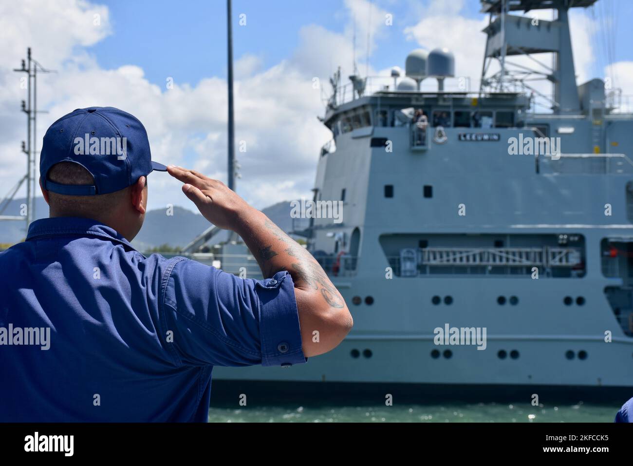 The crew of the Sentinel-class fast response cutter USCGC Oliver Henry ...