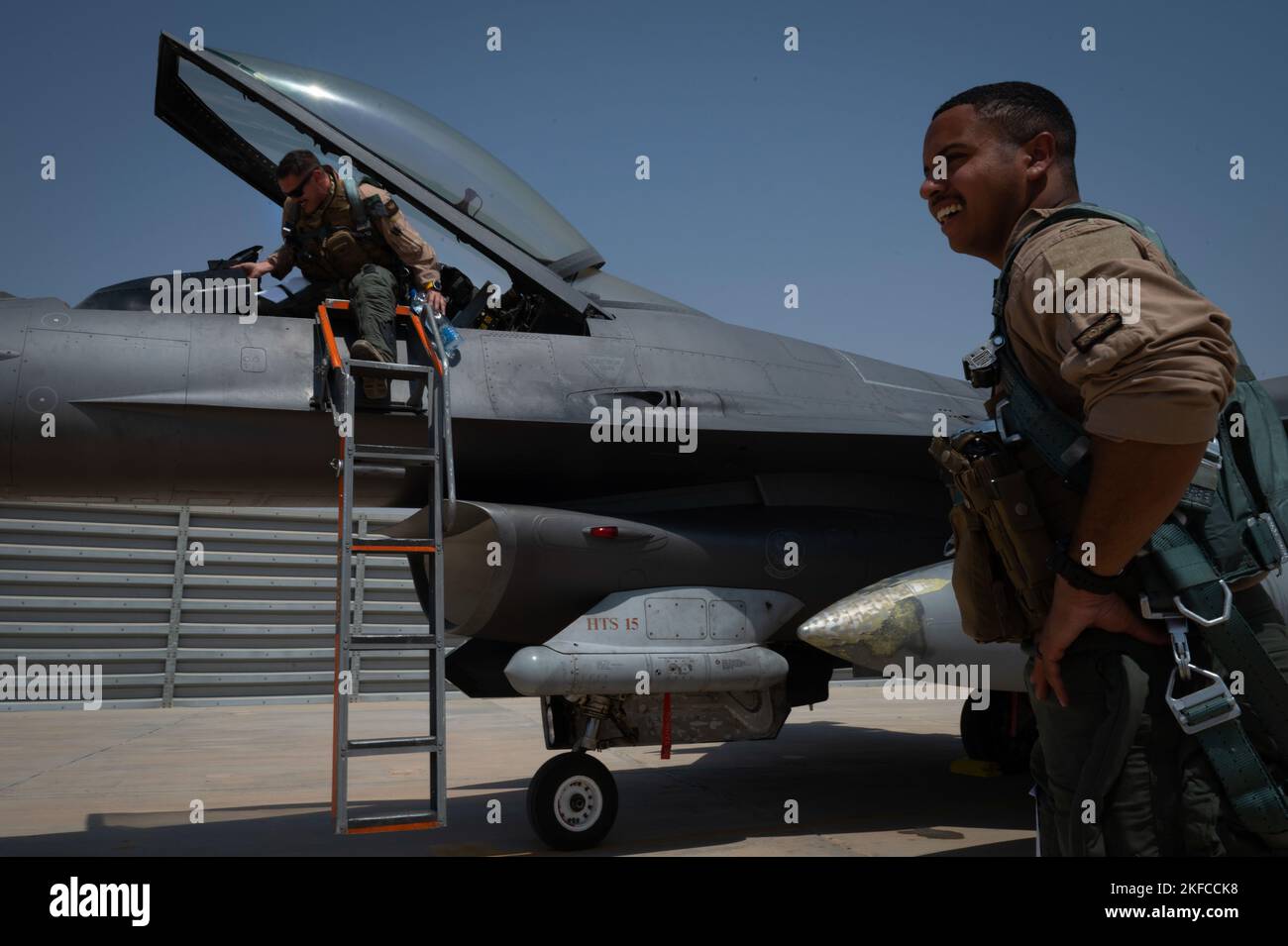 U.S. Air Force Capt. Michael Alekos, right, greets Lt. Col. Daniel ...
