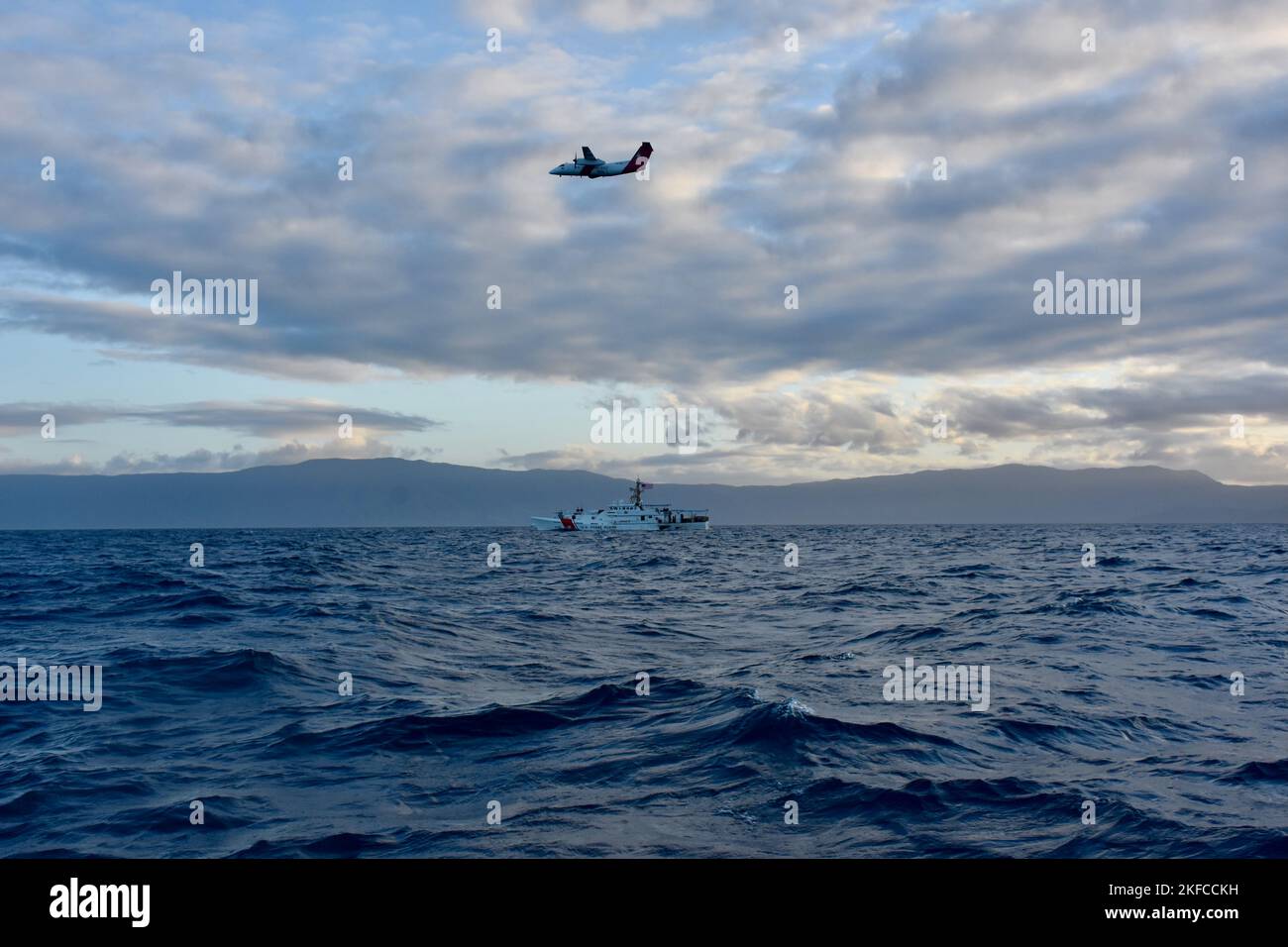 An Australian Border Force plane passes over the Sentinel-class fast ...