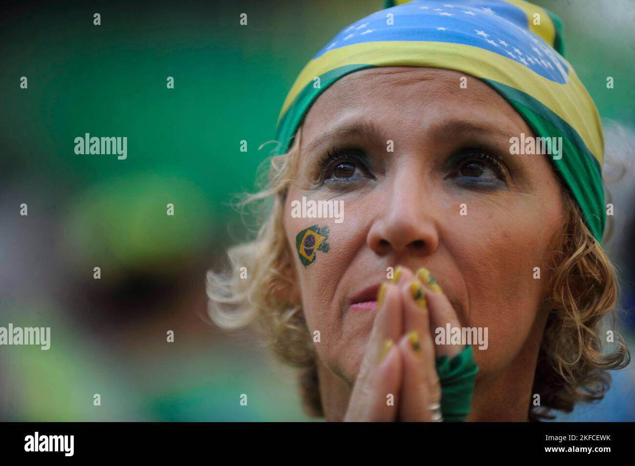 Brazilian fans gather at street party to support national soccer team ...