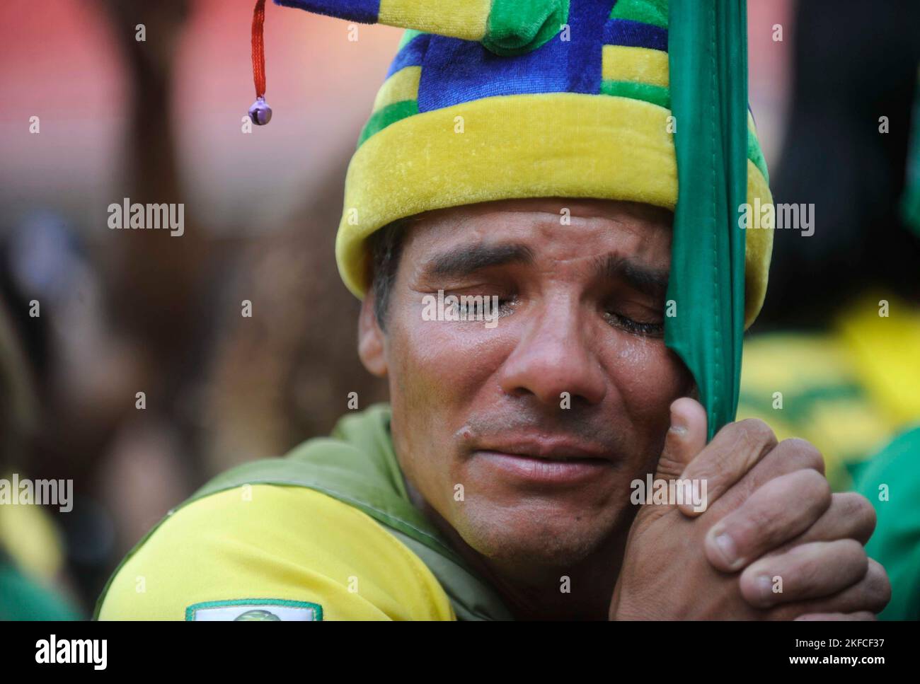 Brazilian fans gather at street party to support national soccer team ...