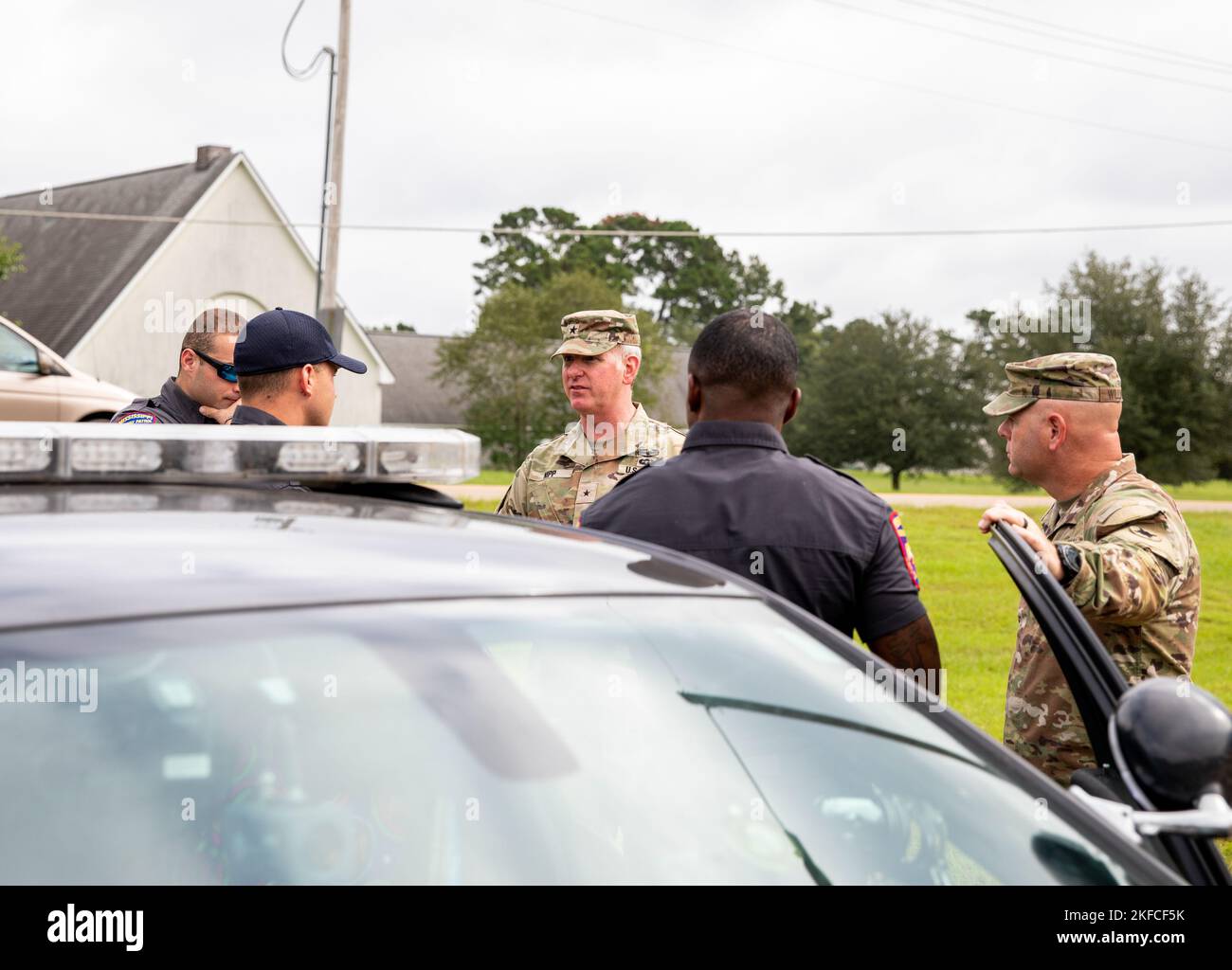 Brig. Gen. John Nipp (center), commander of the 184th Sustainment ...