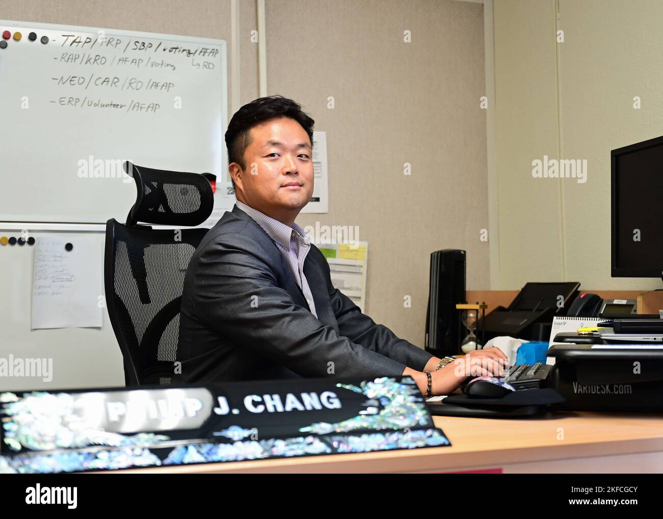 Phillip Chang, Military & Family Readiness Center flight chief, works ...