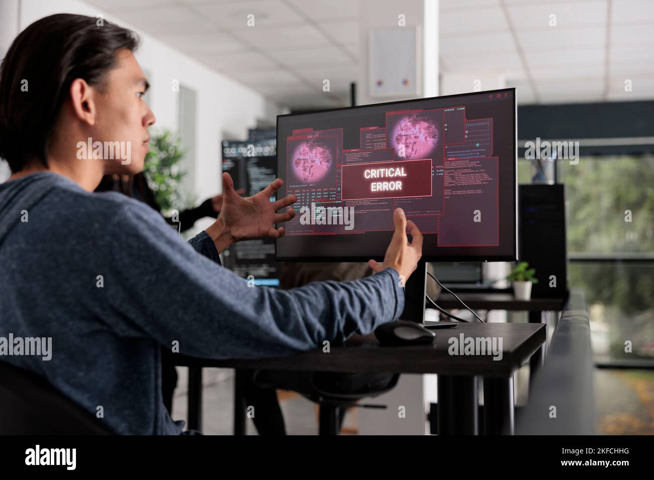 Nervous App Developer Having System Error Message On Computer Screen Trying To Solve Hacking