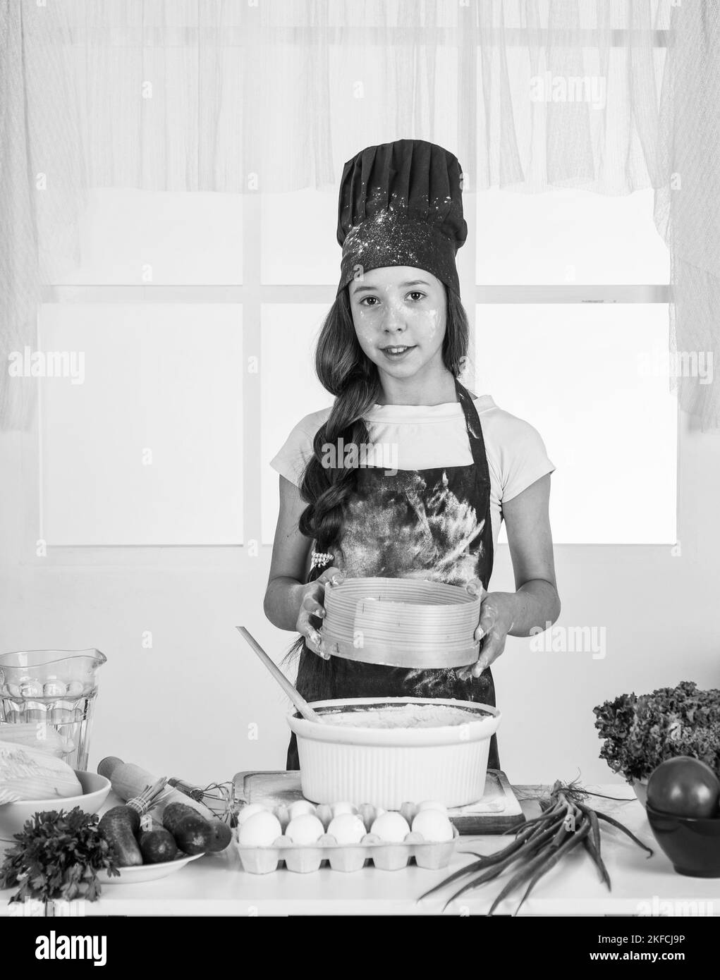 girl kid in chef apron and hat cooking, brunch Stock Photo - Alamy