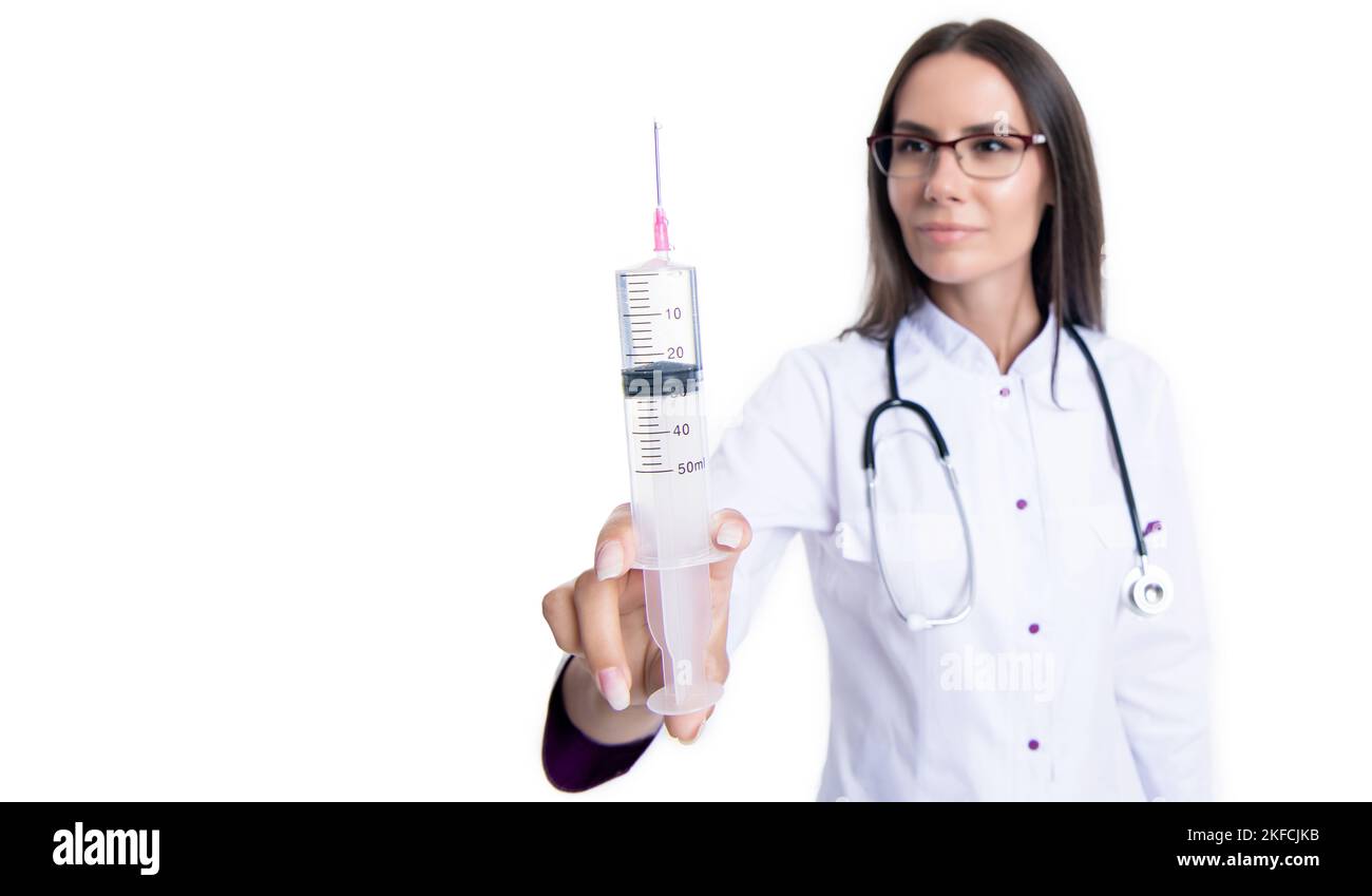 selective focus of syringe. medical doctor do injection with syringe ...