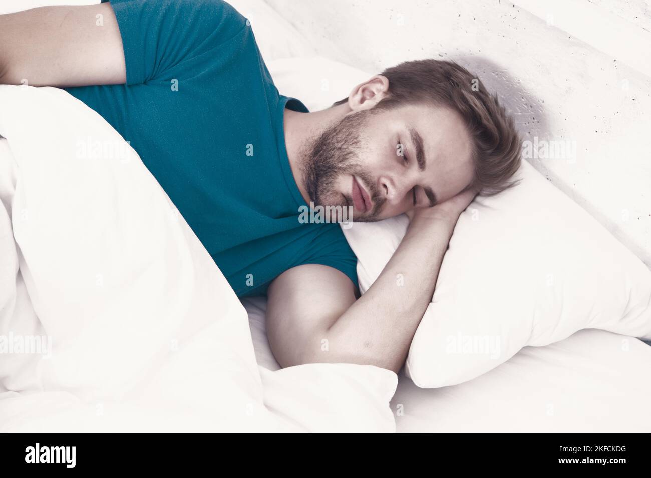 Tips sleeping better. Man handsome guy sleeping. Get enough amount of ... Tips sleeping better. Man handsome guy sleeping. Get enough amount of ...