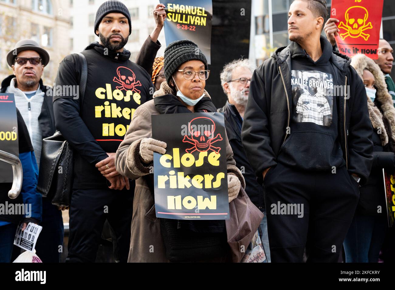 New York, United States. 17th Nov, 2022. People hold placards saying ...