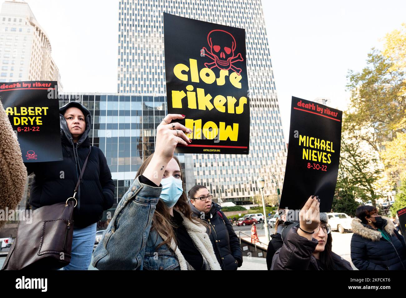 New York, United States. 17th Nov, 2022. People hold placards saying ...